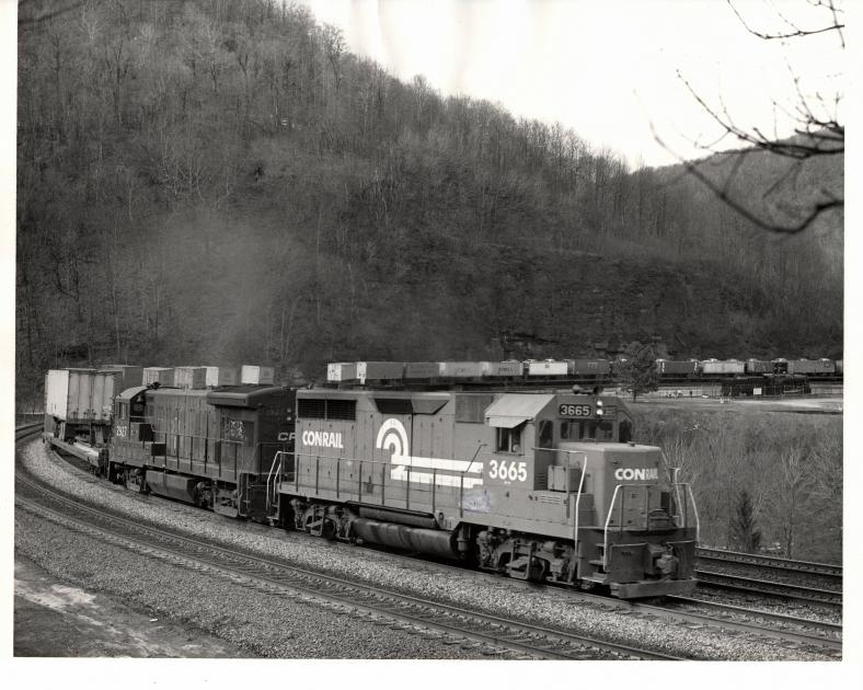 Photograph of GP35 3665 and U33B 2927 on a TV train at Horseshoe Curve. 3/8/77 | The CRHS's ...
